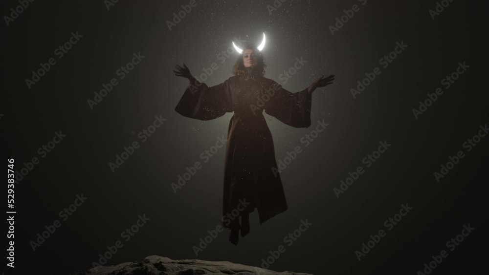 The mystical goddess of the night with a shining crescent moon above ...