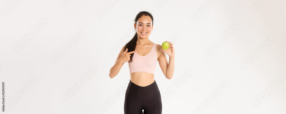 Sport, wellbeing and active lifestyle concept. Portrait of smiling slim ...