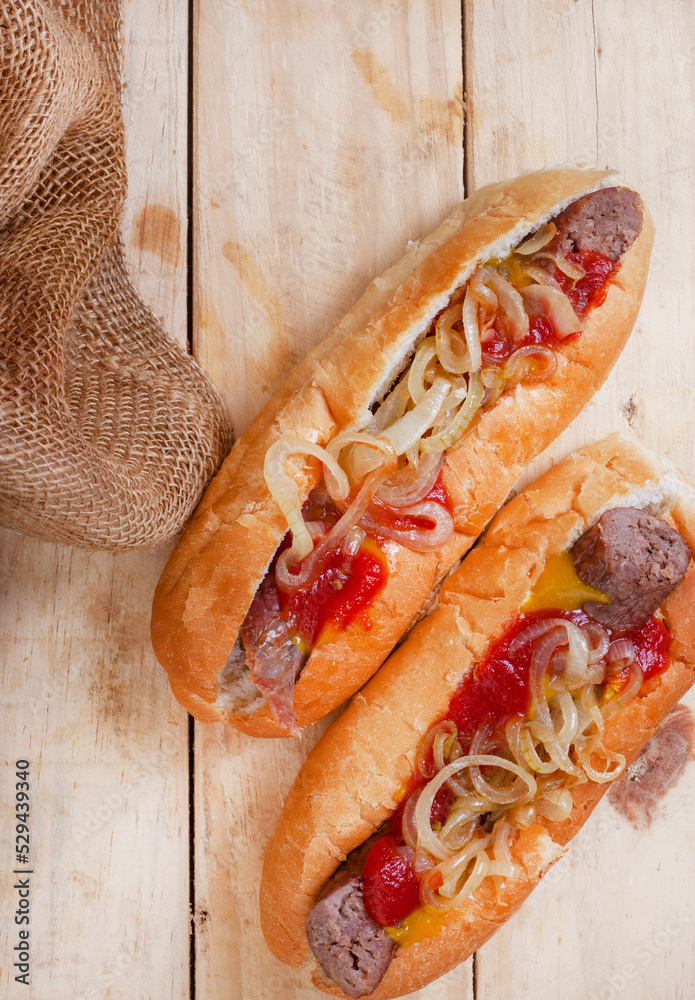 South African famous boerewors roll, juicy and topped with onions on a ...