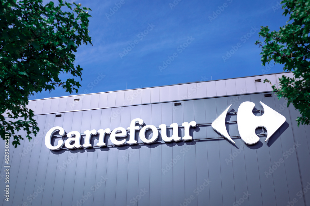 Poznan, Poland - September 9, 2022. Carrefour logo on a shopping center ... Poznan, Poland - September 9, 2022. Carrefour logo on a shopping center ...