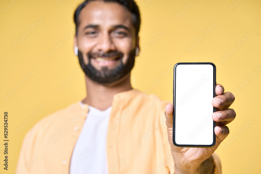 Happy indian man showing cellphone big mockup white blank phone ...