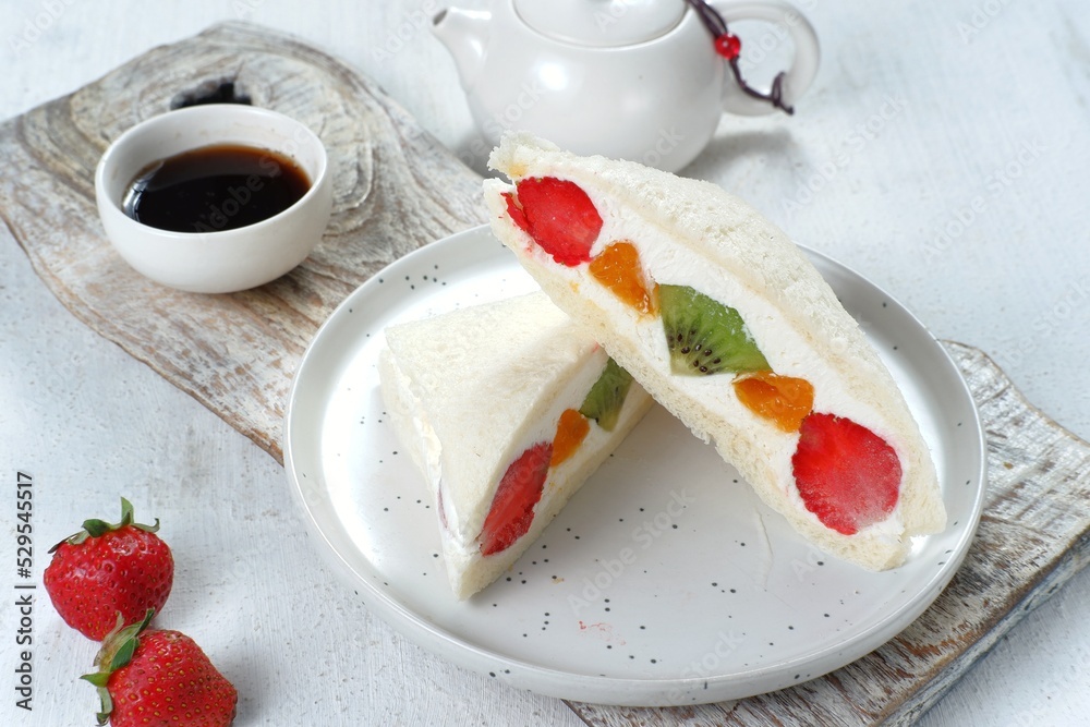 Japanese style sweet fruits sandwich (fruit sando ) with lots of fruits ...