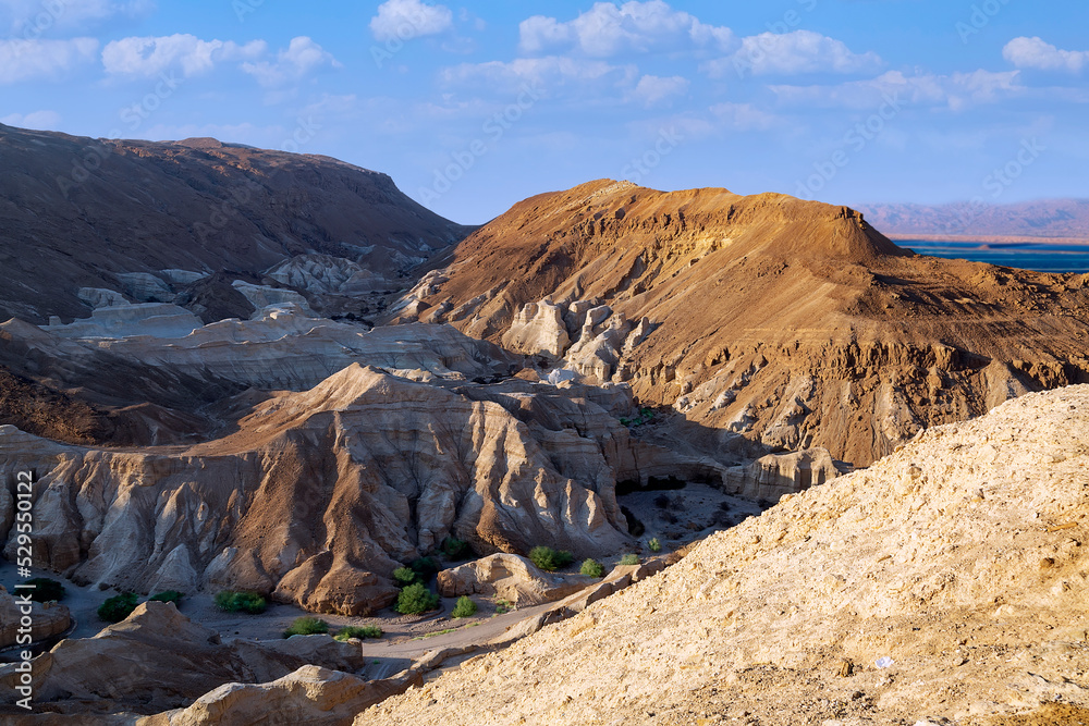 Mountain Sodom Gomorrah. Beautiful clouds on blue sky. Golden sand ...