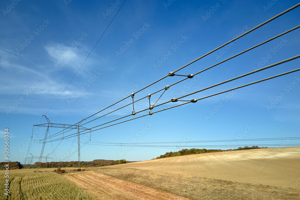 Electric power lines divided by safe guard insulating frame transfening ...