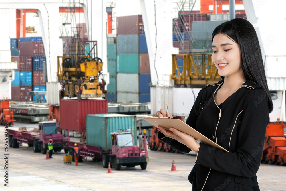 Engineer inspector for crane loading containers to trucks in an import ...