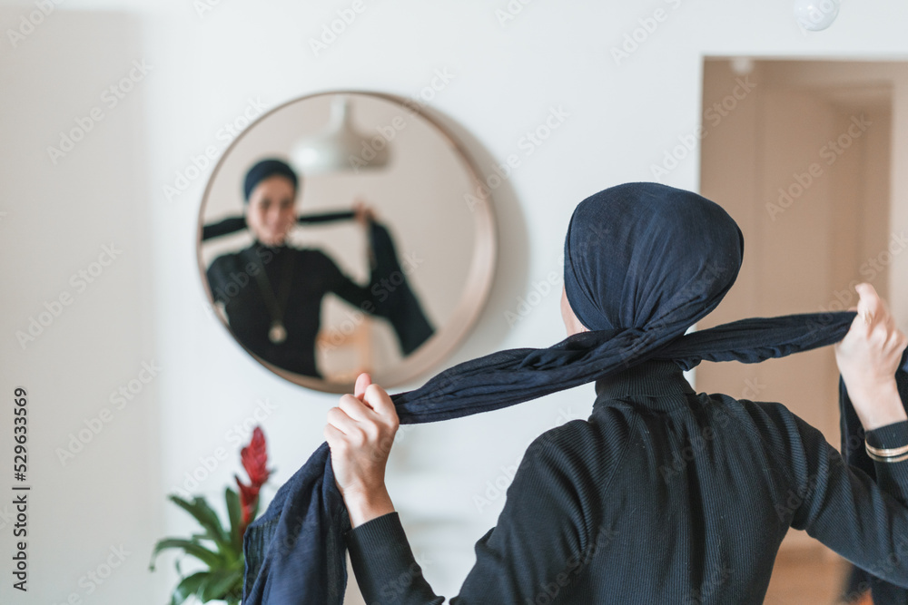 Jewish religious woman ties a shawl around her head. Jewish traditions (73) Stock Photo | Adobe ...