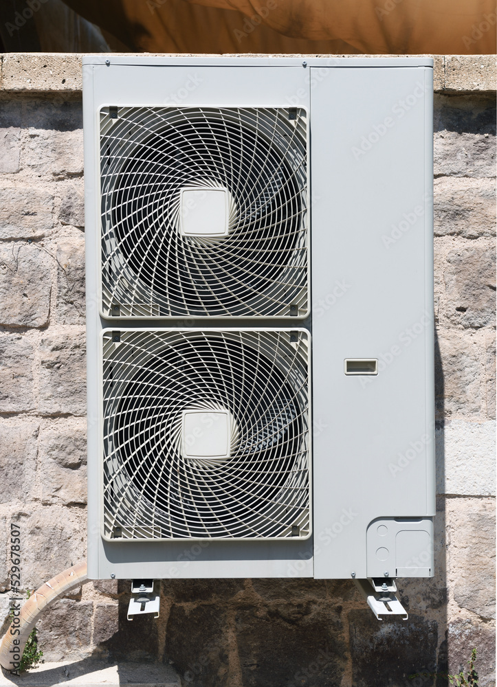 Outdoor air conditioning unit with inverter installed on the terrace ...