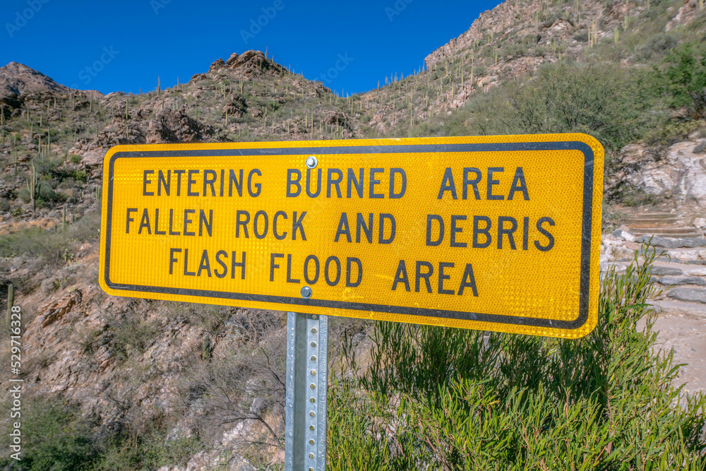 Warning sign: Entering burned area fallen rock and debris flash flood ...