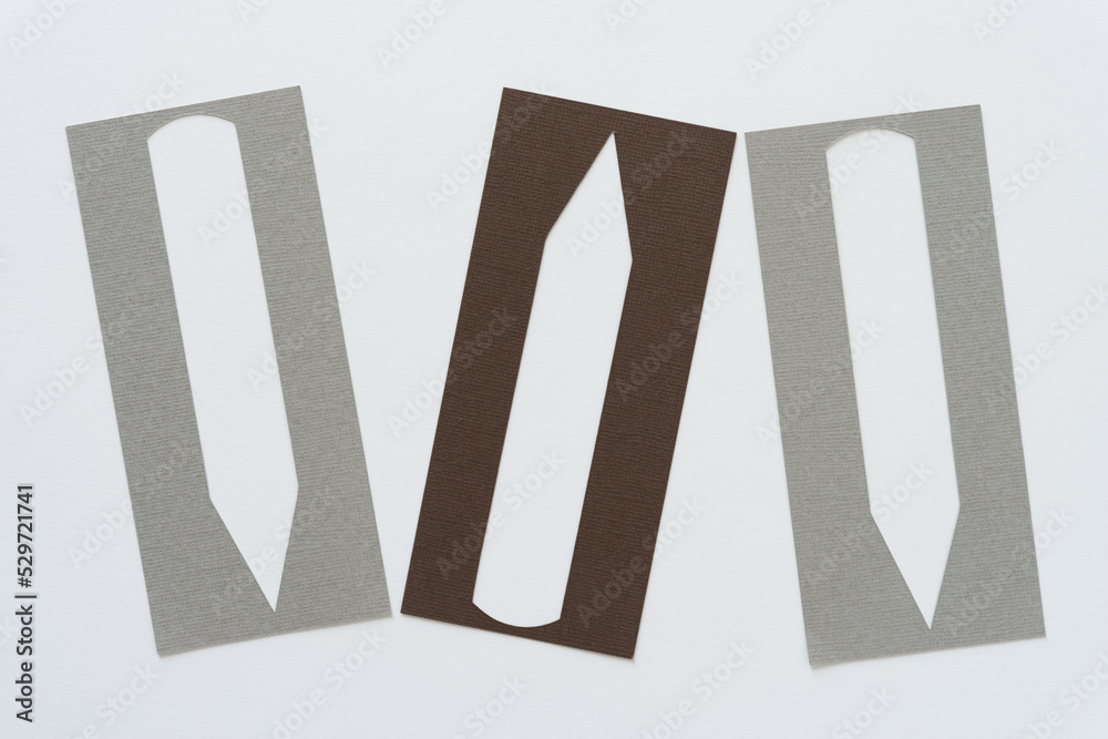 paper stencils with pointy shapes (pencils) on blank paper Stock Photo ...