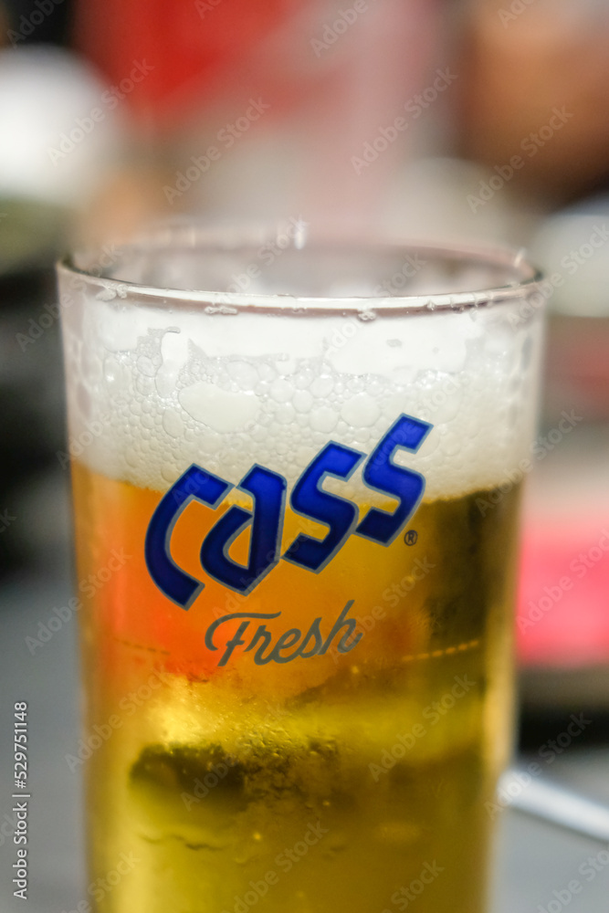 Bangkok, Thailand - 8 May 2022: A Glass of Cass Fresh, a lager style ...