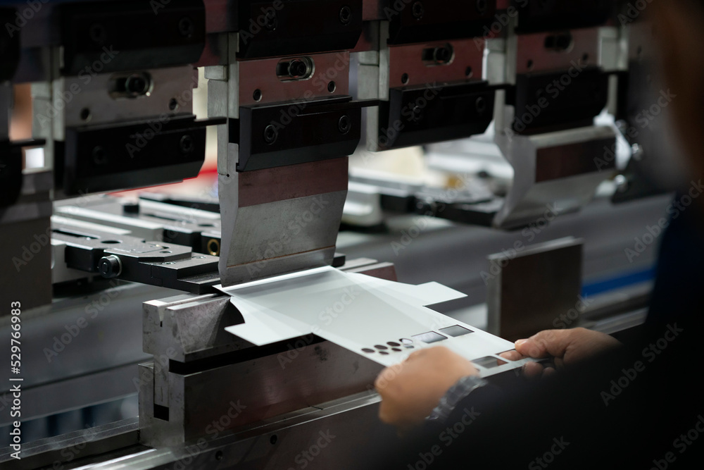 operator bending metal sheet by sheet bending machine Stock Photo ...