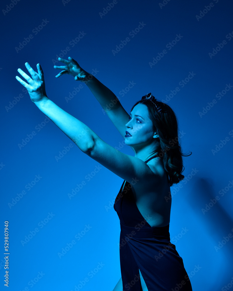 Close up portrait of beautiful woman model wearing elegant black dress ...