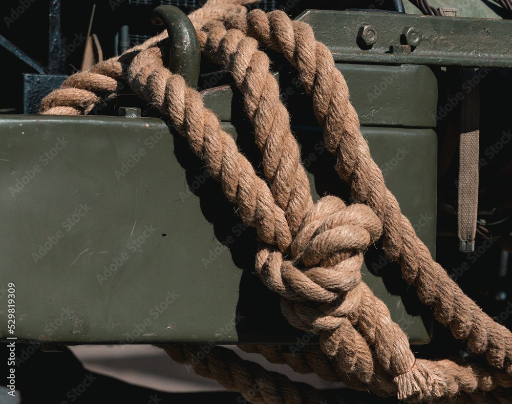 Powerful car winch with rope. Metal cable winch. Winch with cable close ...