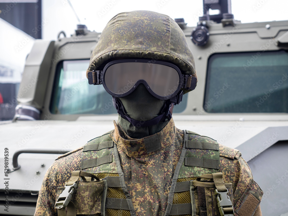 Soldier uniform. Mannequin in military helmet and clothes. Soldier in ...