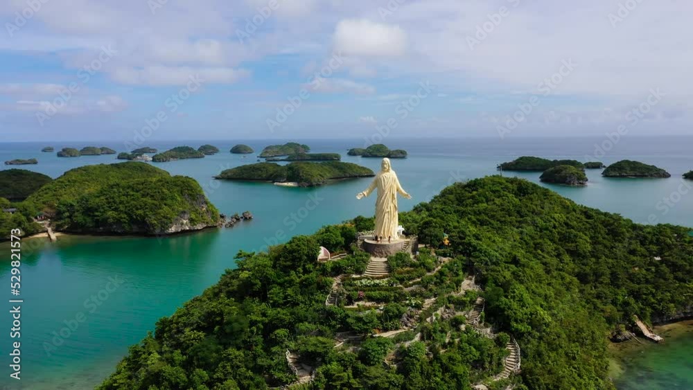 One hundred Islands national Park and the statue of Christ located on Pilgrimage island ...