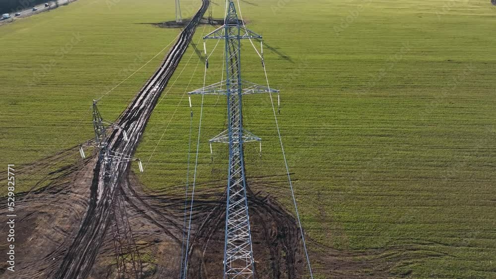 Vidéo Stock Aerial circling view of steel erector workers strengthen a ...