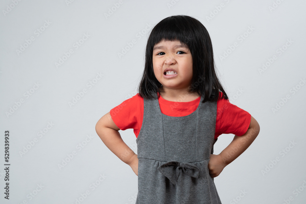 Portrait of Asian angry and sad little girl on white isolated ...