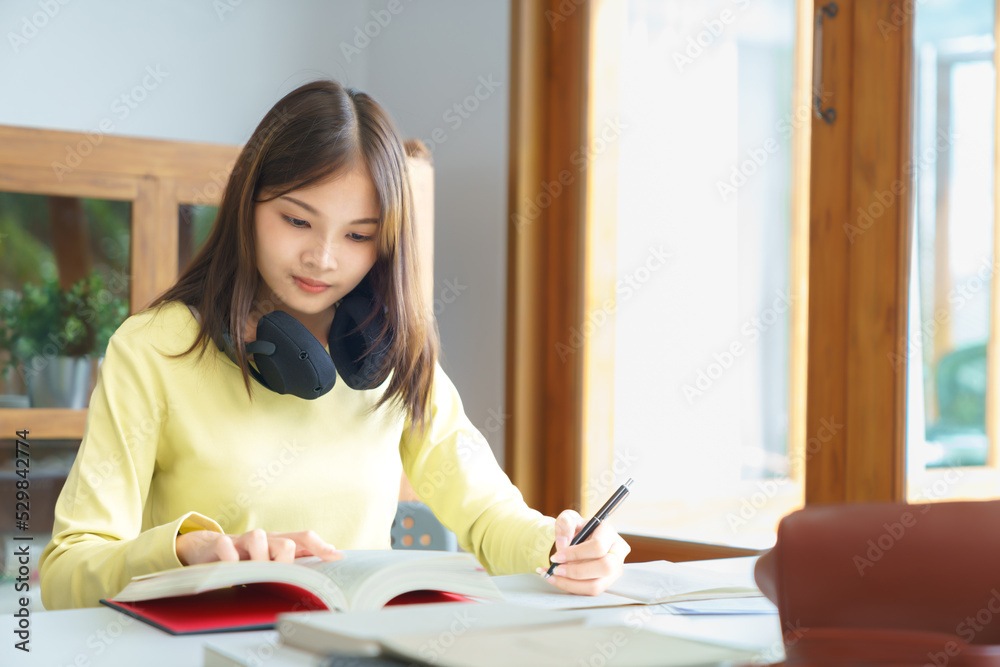 Education and literacy concept, College student girl reading textbook ...
