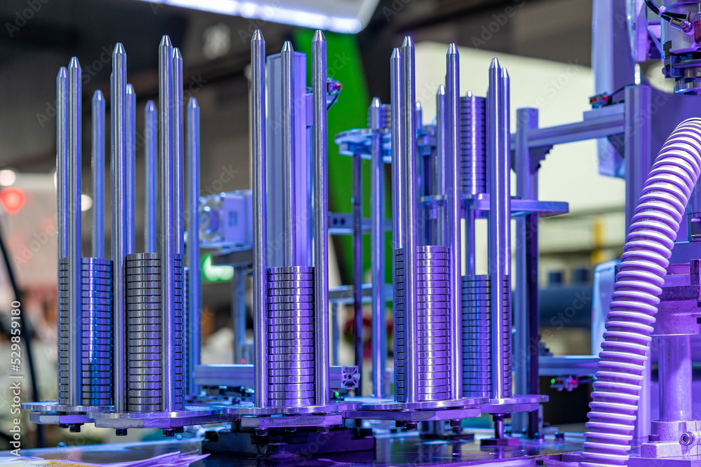 Steel ring or metal workpiece arranged in vertical rows for move to ...