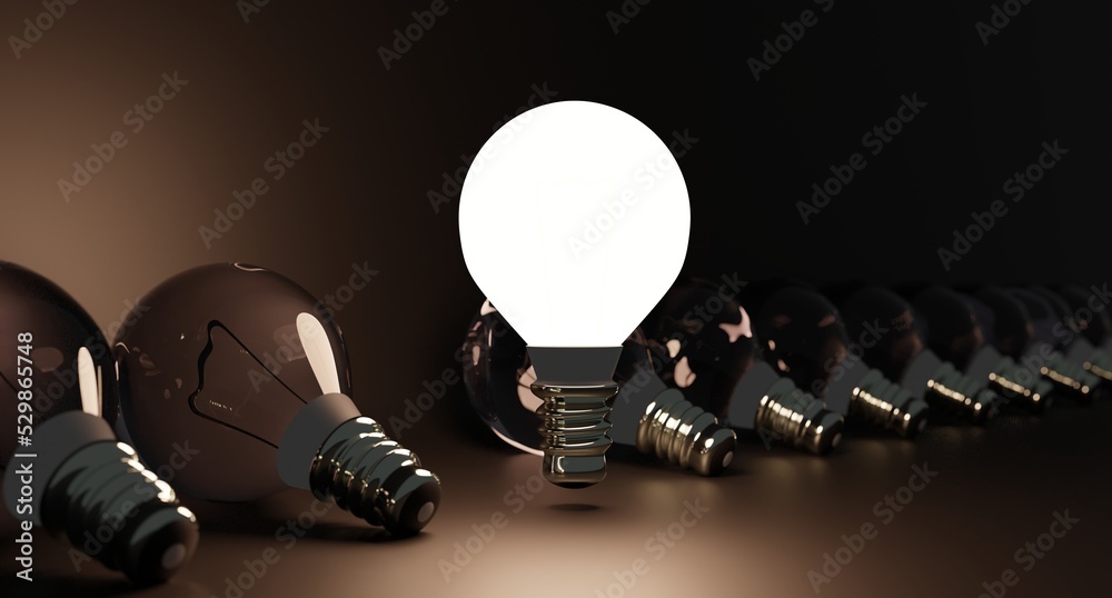 One glowing light bulb amongst the unlit incandescent bulbs on white ...