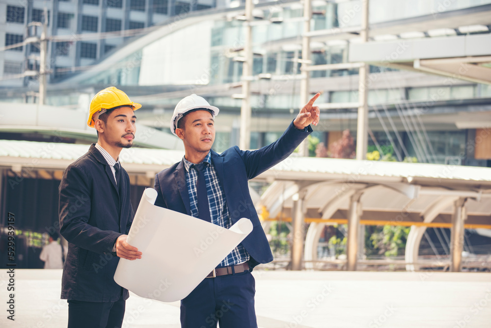 Civil Construction engineer teams shaking hands together wear work ...