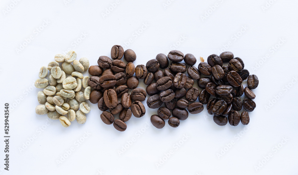 Coffee beans on a white background. Raw coffee beans. Light roast ...