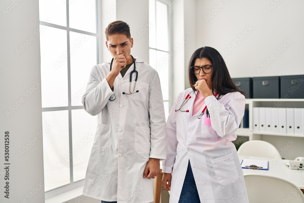 Young doctors wearing uniform and stethoscope at the clinic feeling ...