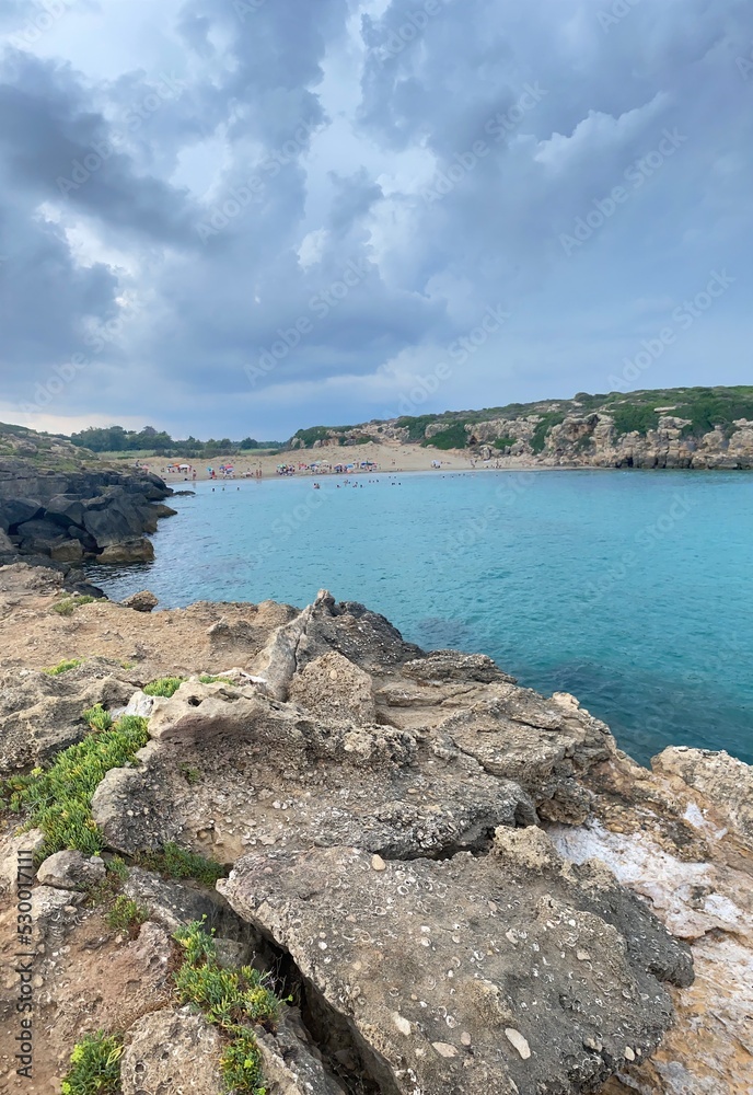 Panoramic vertical view of the small gulf where the Calamosche beach is ...