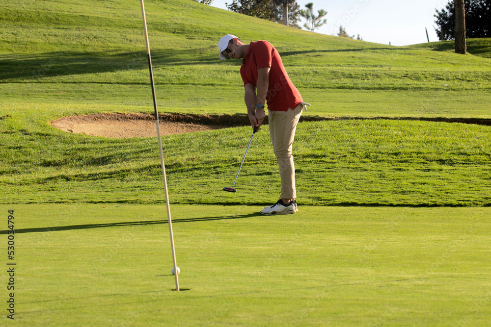 Golf professional front view on the green. professional golf player ...