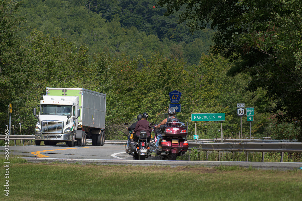 A group of friends rides together on their motorcycles in Early ...