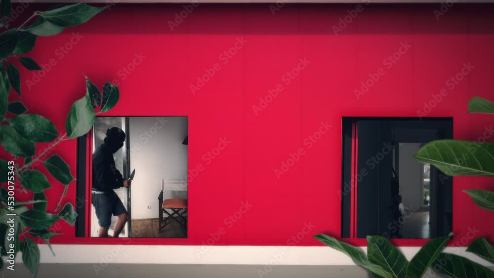 Scary Man Knife Home Invasion Window View, Zoom In. Hooded figure armed ...