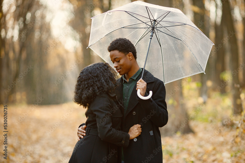 Black Couple Walking In Park