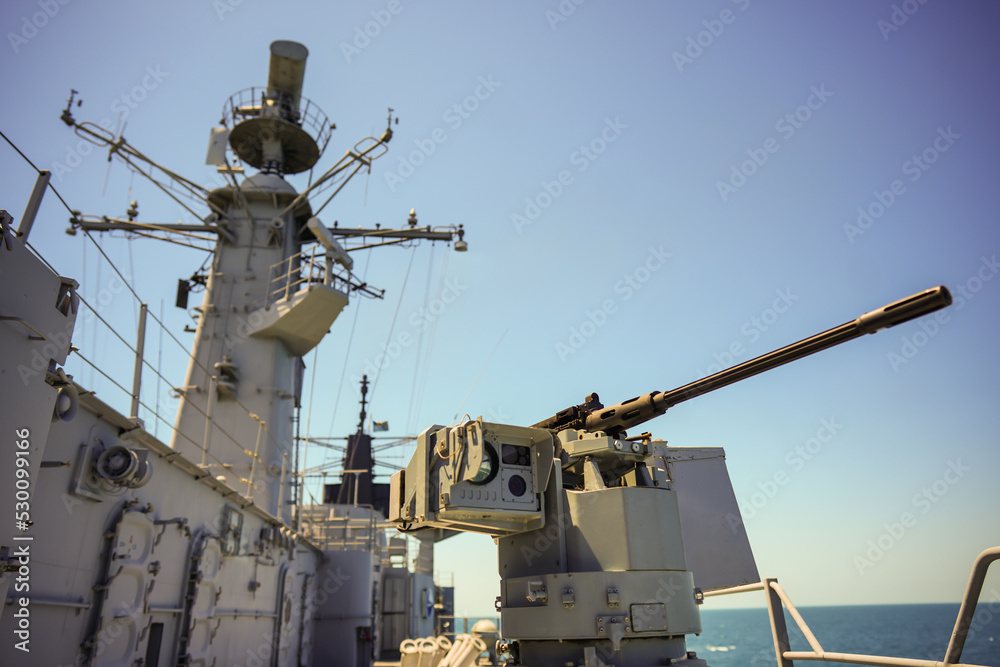 Automated machine gun on the deck of a military ship Stock Photo ...