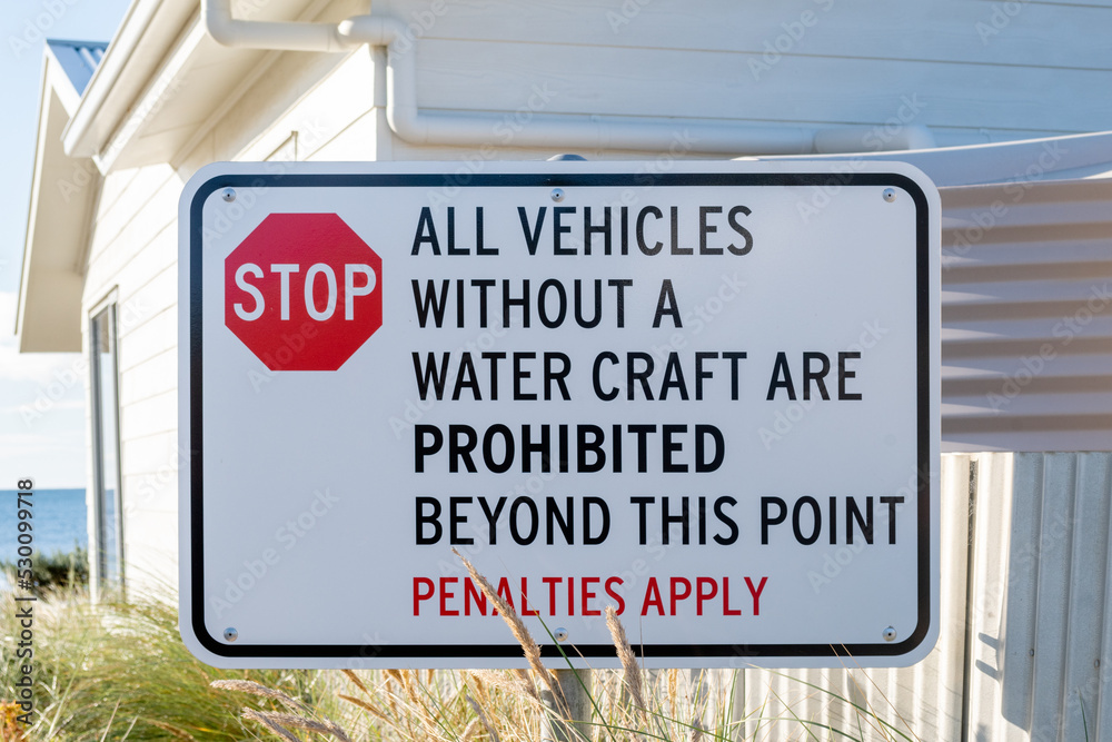 Road sign on the sea beach STOP All vehicles without a water craft are ...