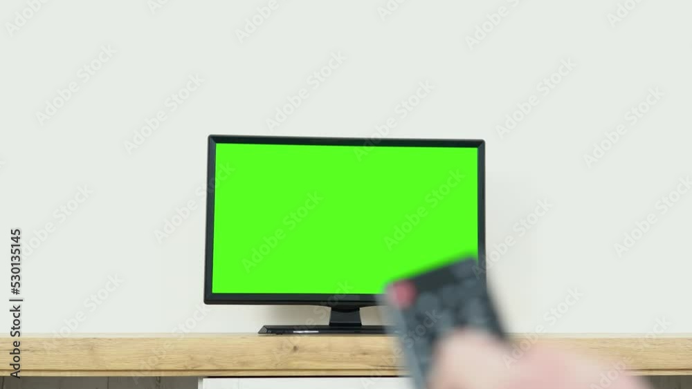 Watching chroma key TV and changing channel by remote control. Channel ...