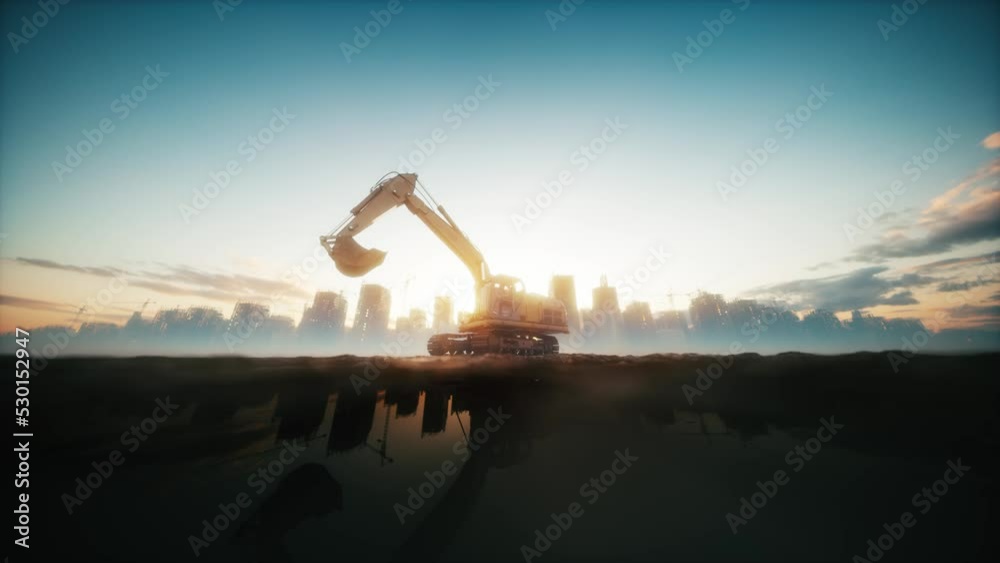 Digger during excavation at construction site. Excavator bucket digs ...