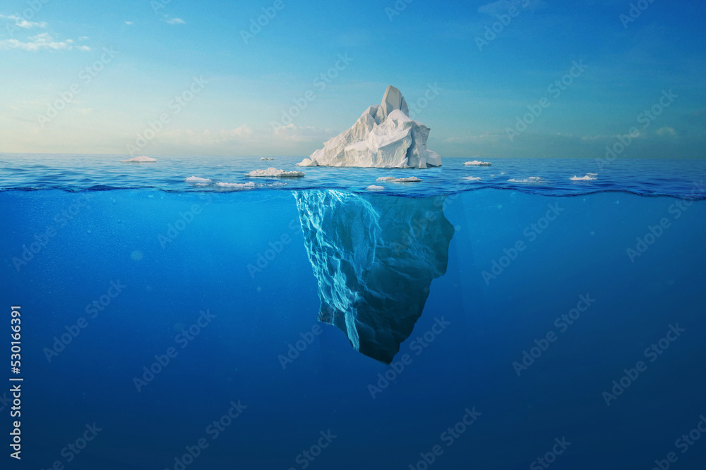 Amazing white iceberg floats in the ocean with a view underwater ...