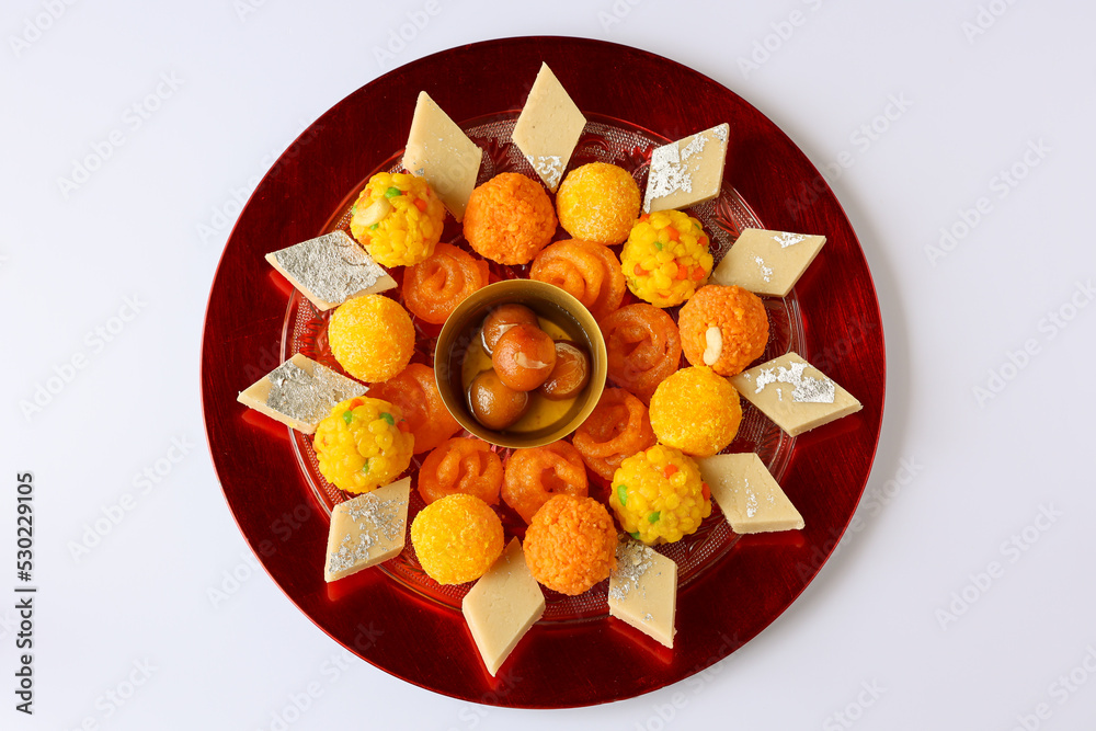 Diwali sweets Mango chum chum barfi petha Laddu Jalebi peda Indian ...