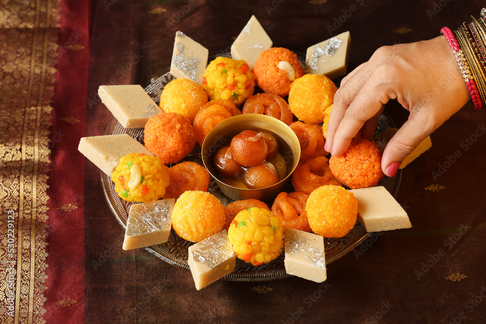 Diwali sweets Mango chum chum barfi petha Laddu Jalebi peda Indian ...