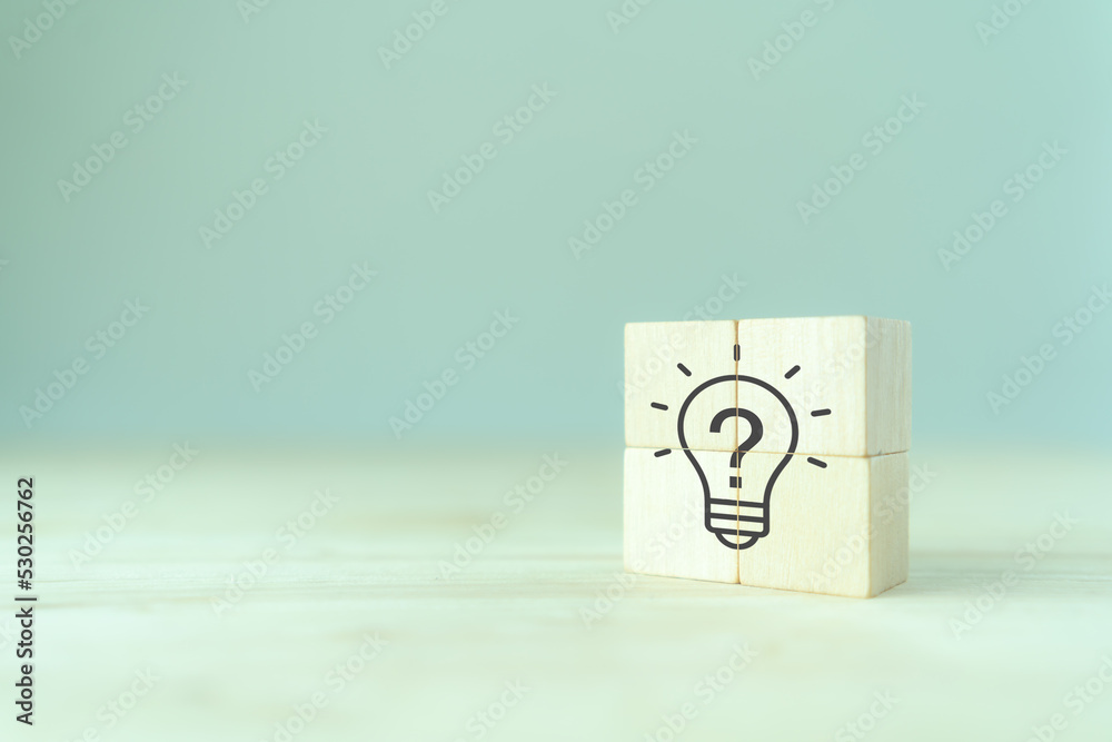 Question marks and light bulb symbolizing idea or solution. Problem solving skill, creativity ...