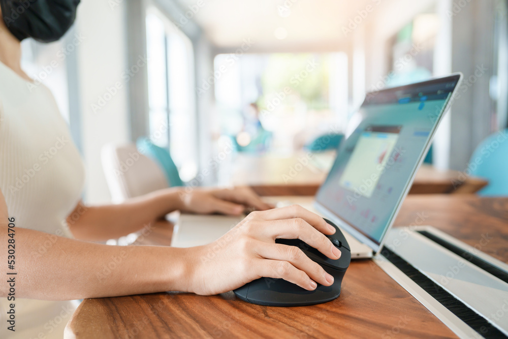 woman hand using computer ergonomic mouse, prevention wrist pain ...