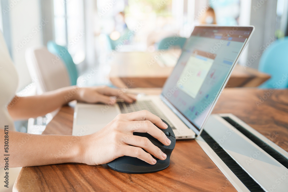 woman hand using computer ergonomic mouse, prevention wrist pain ...
