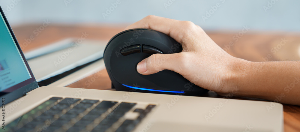 woman hand using computer ergonomic mouse, prevention wrist pain ...