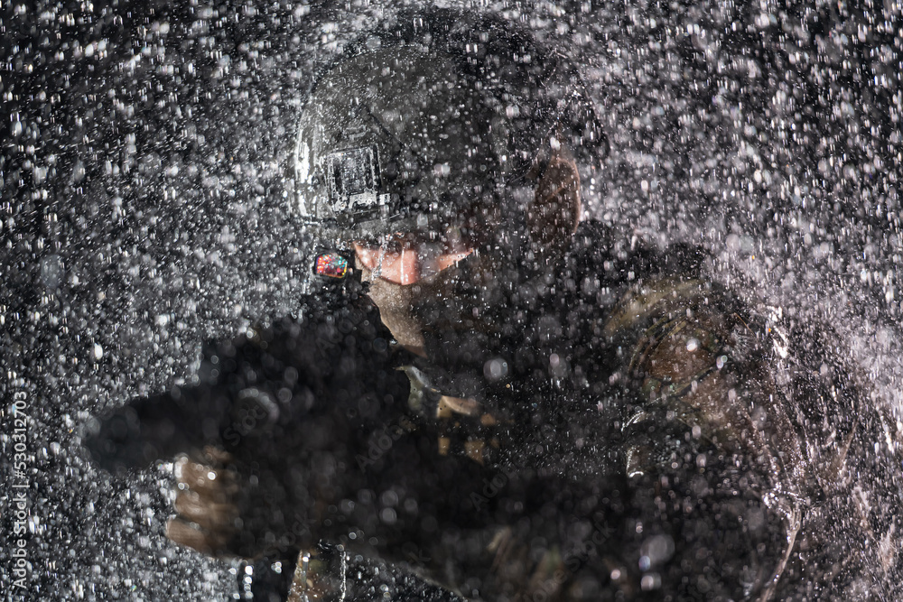 Army soldier in Combat Uniforms with an assault rifle, plate carrier ...