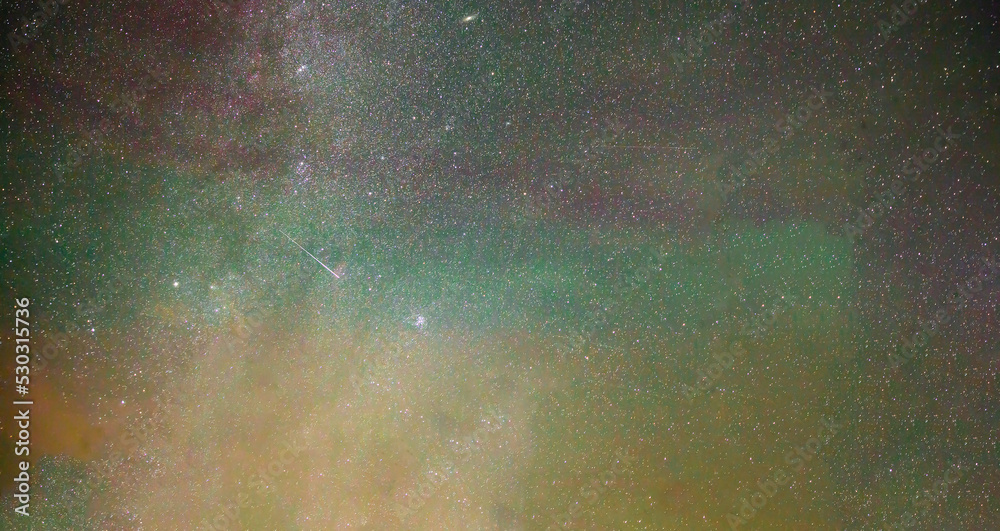 The Perseid Meteor Shower, long exposure photo. A meteor streaks across ...