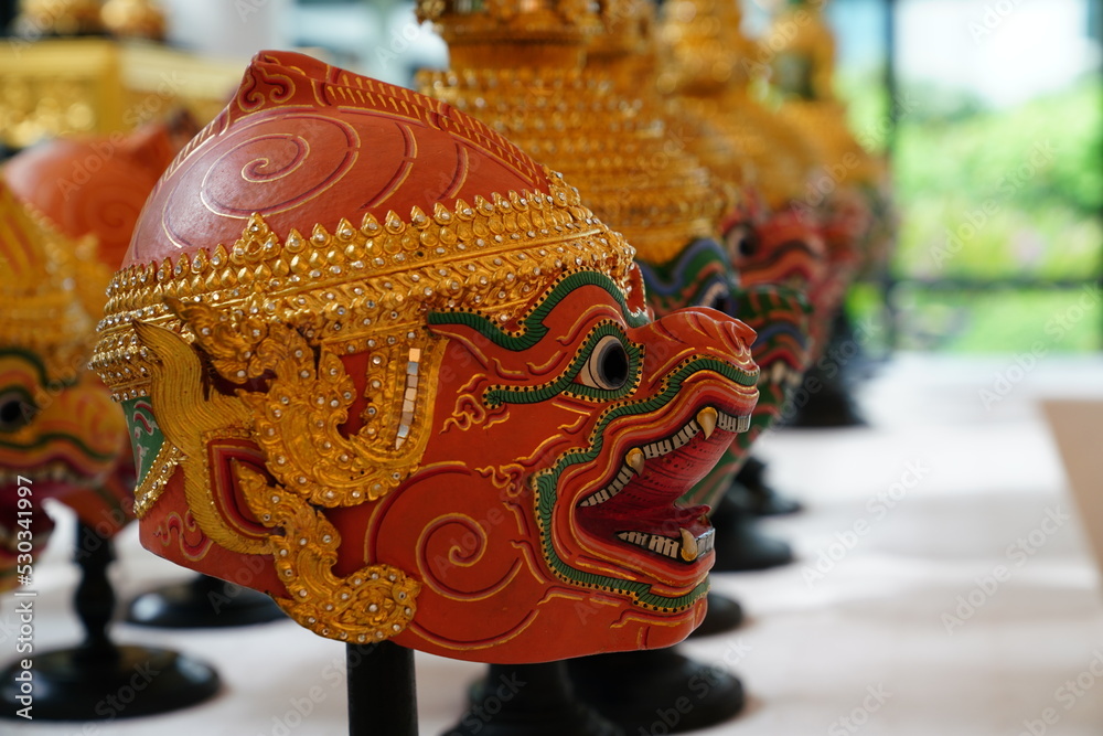 Khon performance, each actor wears a head with a mask that represents ...