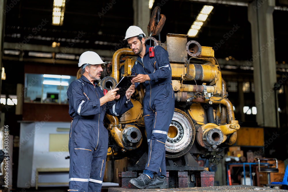 In heavy industry maintenance manager meet engineer checking and ...