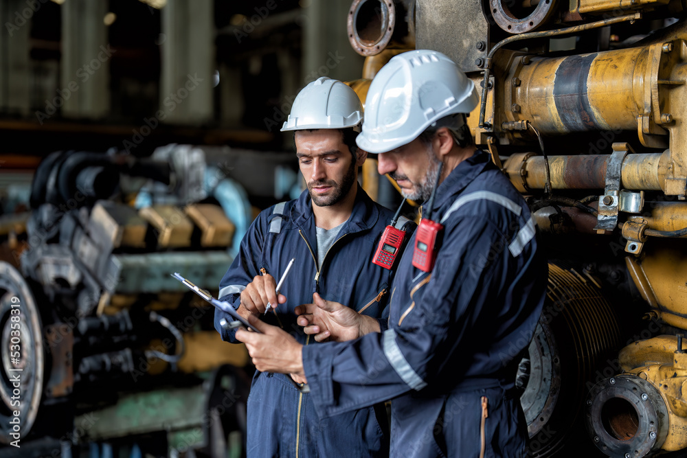 In heavy industry maintenance manager meet engineer checking and ...