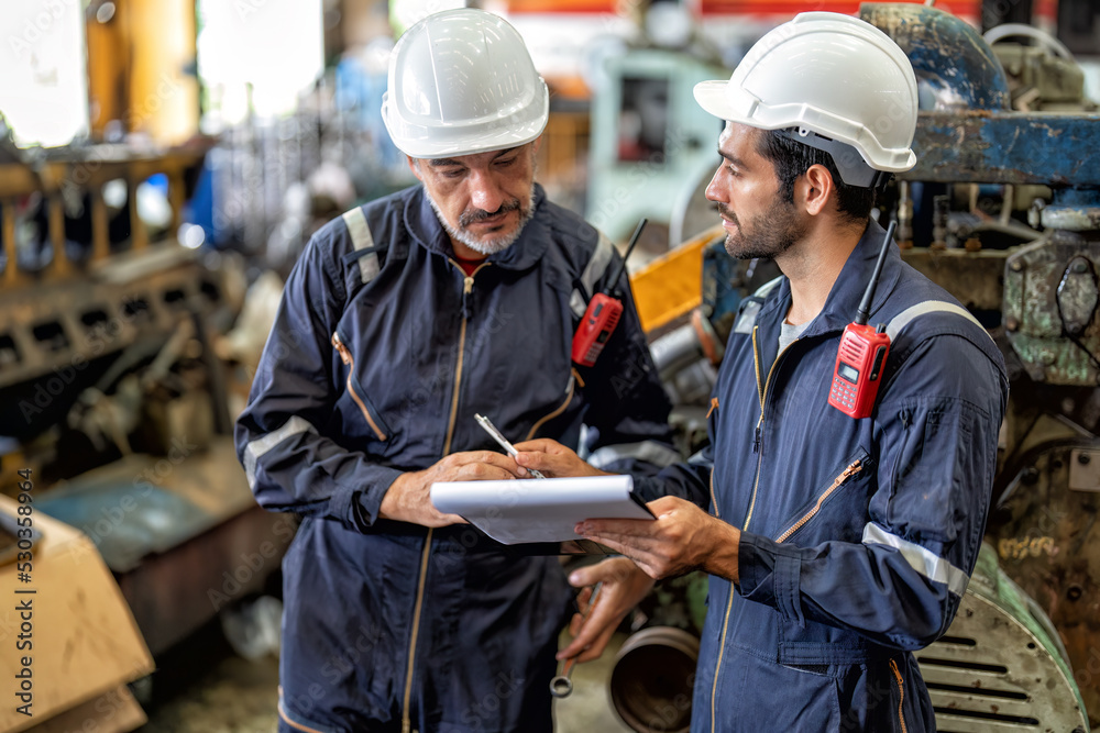 In heavy industry maintenance manager meet engineer checking and ...