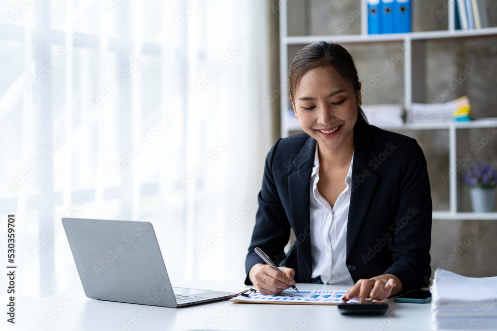 Foto de finance and accounting concept. woman hand press on a ...
